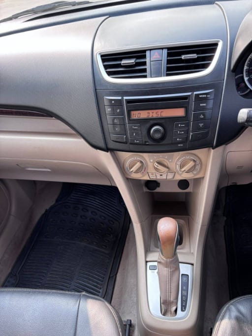 2012 Maruti Swift Desire VXI (P) Auto - Car Planet Wheels